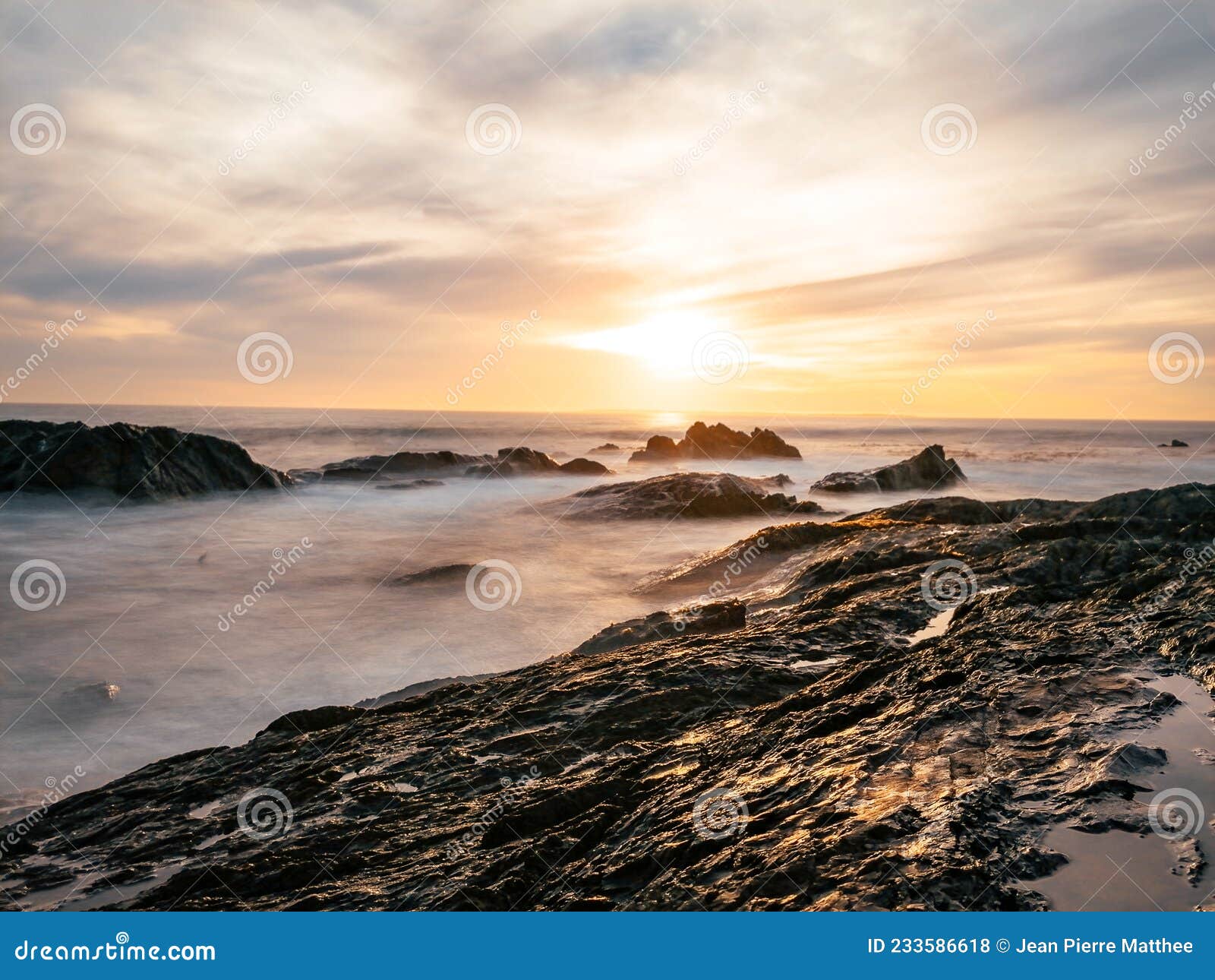 Sunset on the Rocks stock photo. Image of beach, long - 233586618