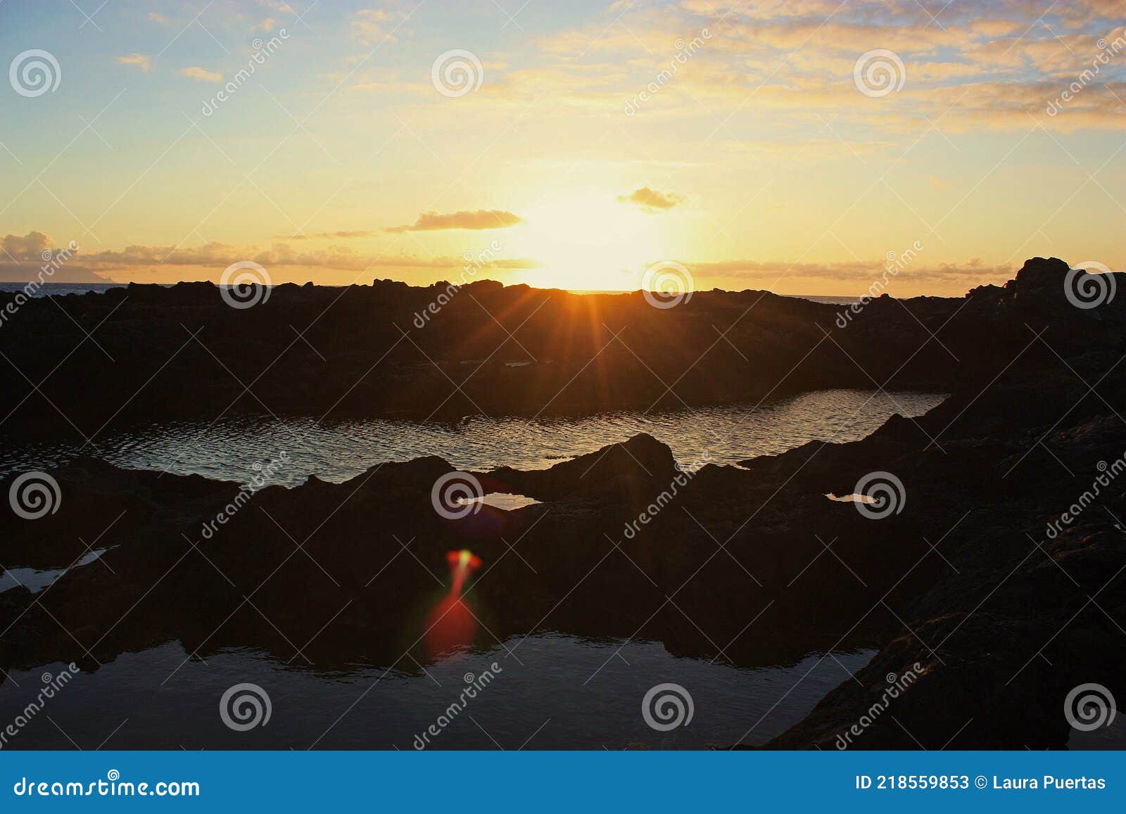 Sunset Over Rocks and the Sea Stock Image - Image of tropical, calm ...