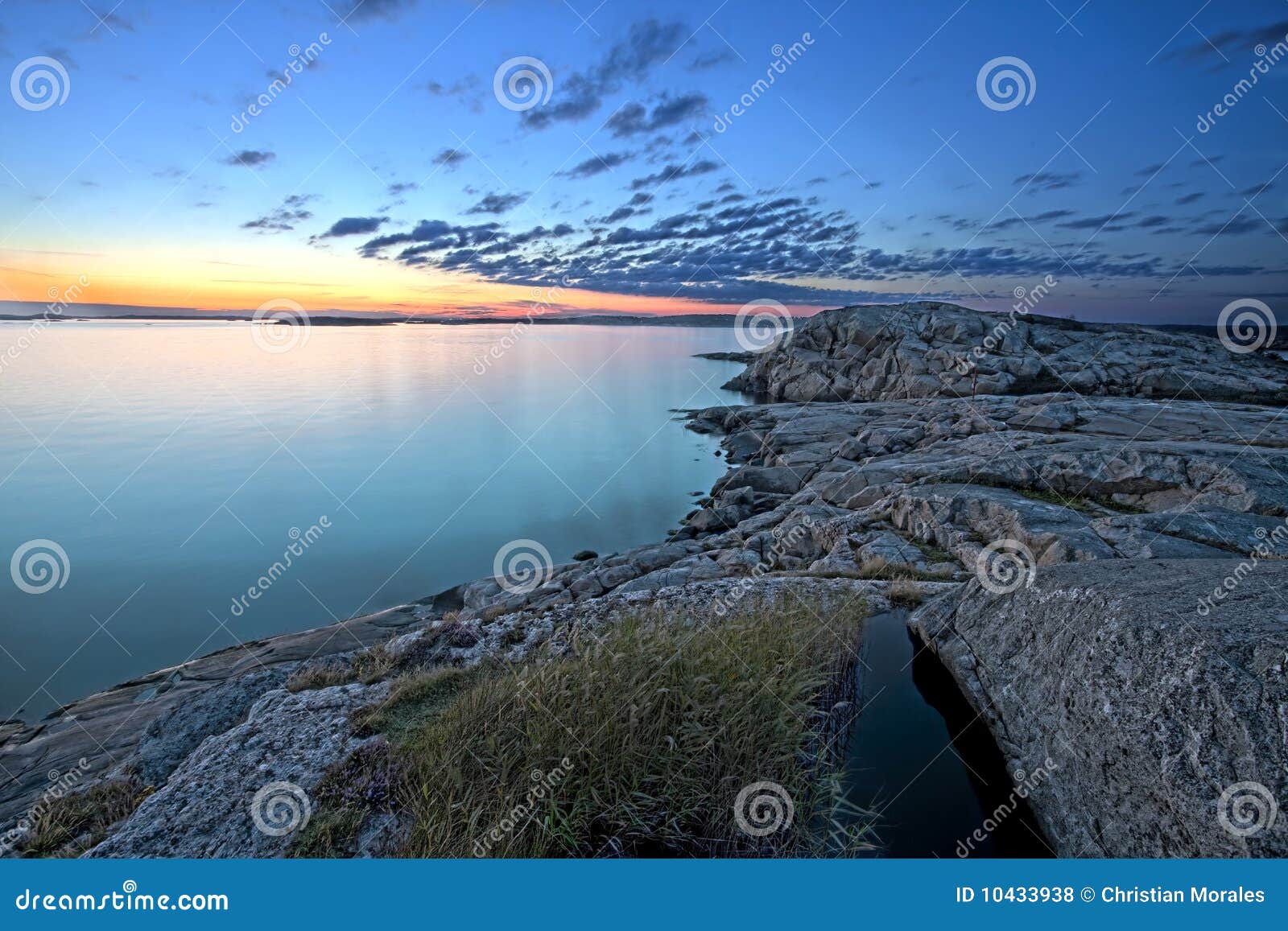 Sunset Over Rocky Coastline Stock Photo - Image of coast, horizon: 10433938