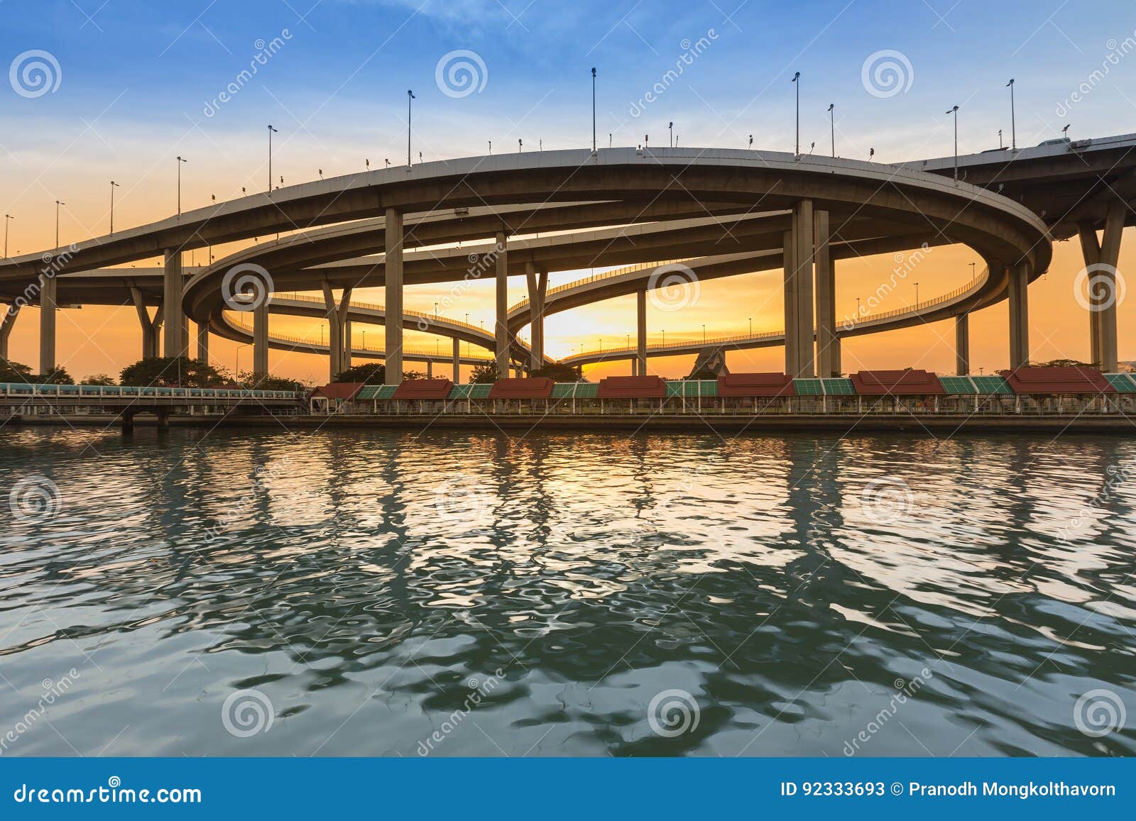 Sunset Over Round Highway Intersection River Front Stock Image - Image ...