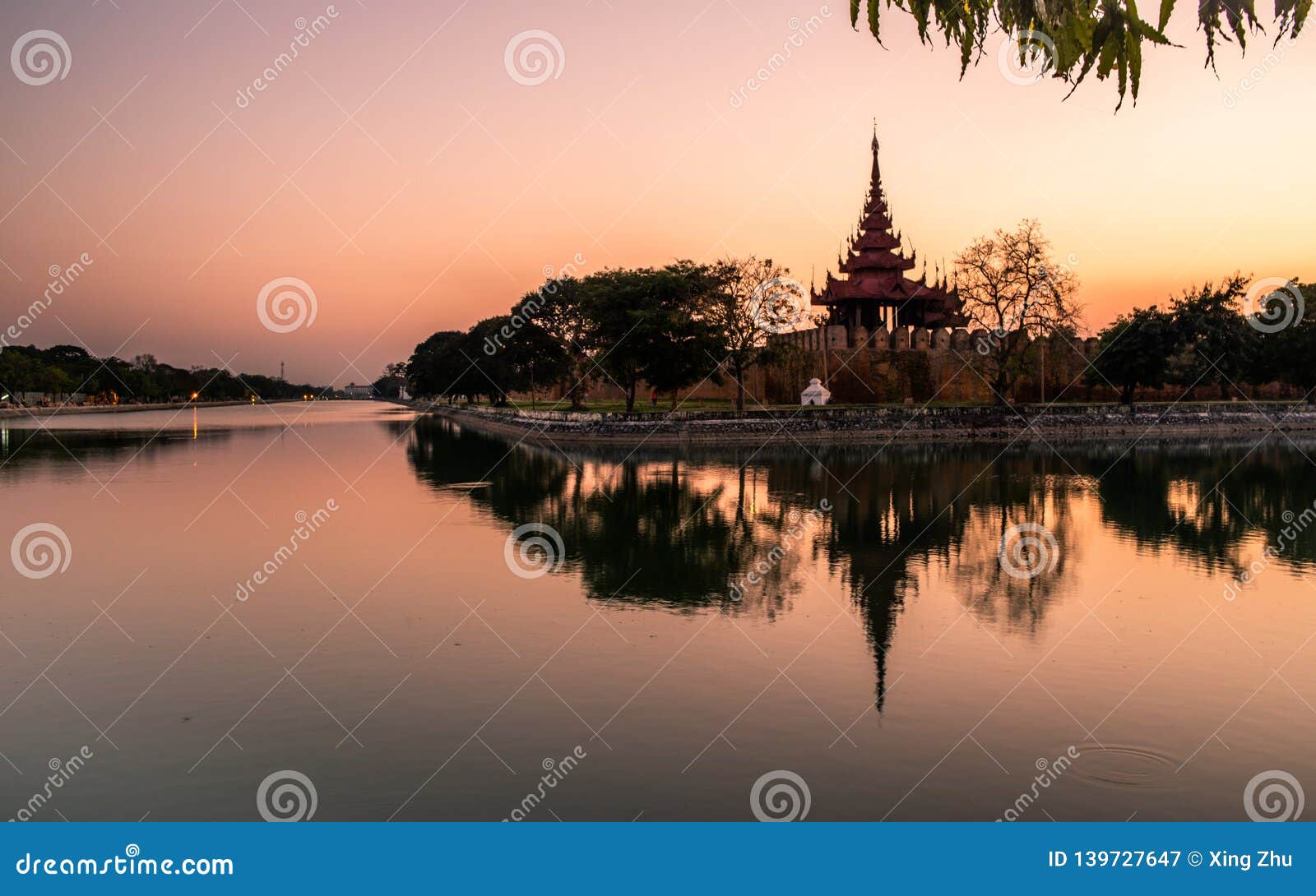 Sunset at Royal Palace, Mandalay, Myanmar. Stock Image - Image of rain ...