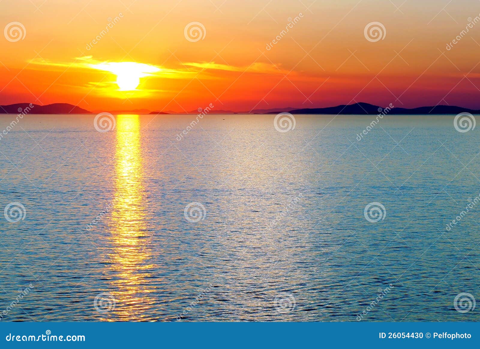 Sunset over the sea. stock photo. Image of level, faraway - 26054430