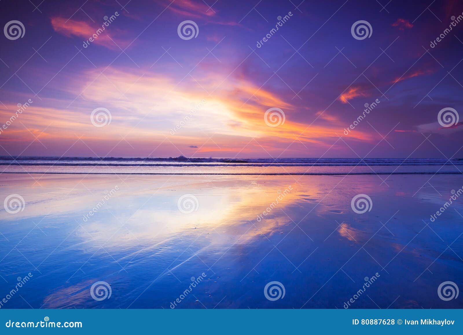 Sunset over sea on Bali stock photo. Image of reflection - 80887628