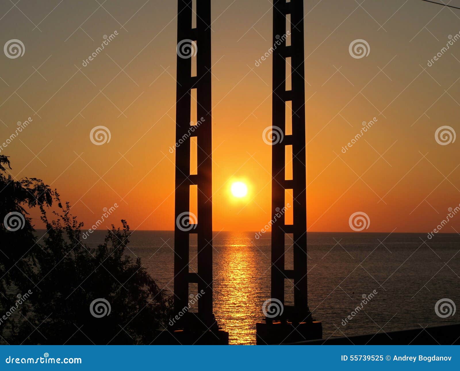 Sunset Over the Sea. Pillars. Stock Image - Image of sunset, evening ...