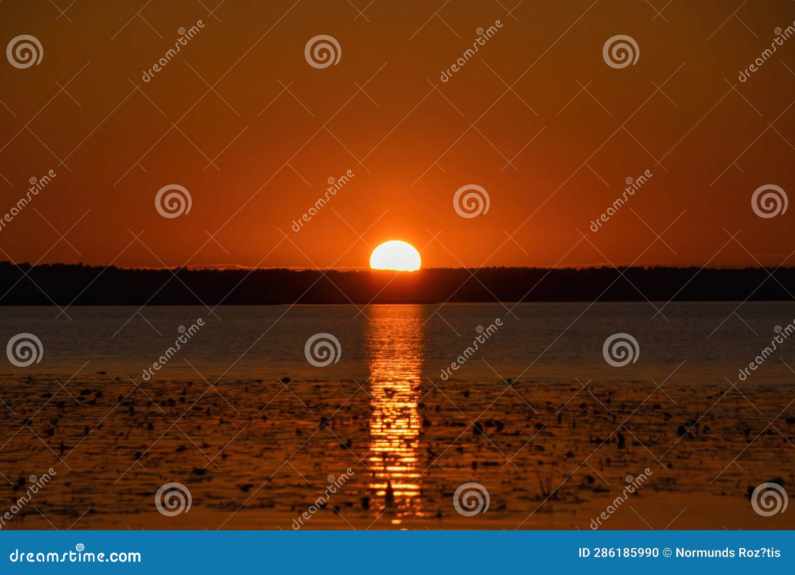 Sunset Over the Shore of Lake Burtnieks Stock Photo - Image of beatiful ...