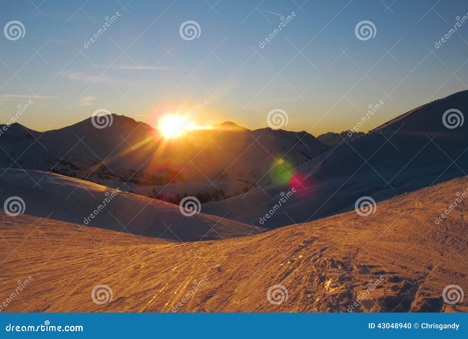 Sunset Over a Snow Covered Alpine Mountain Range Stock Photo - Image of ...