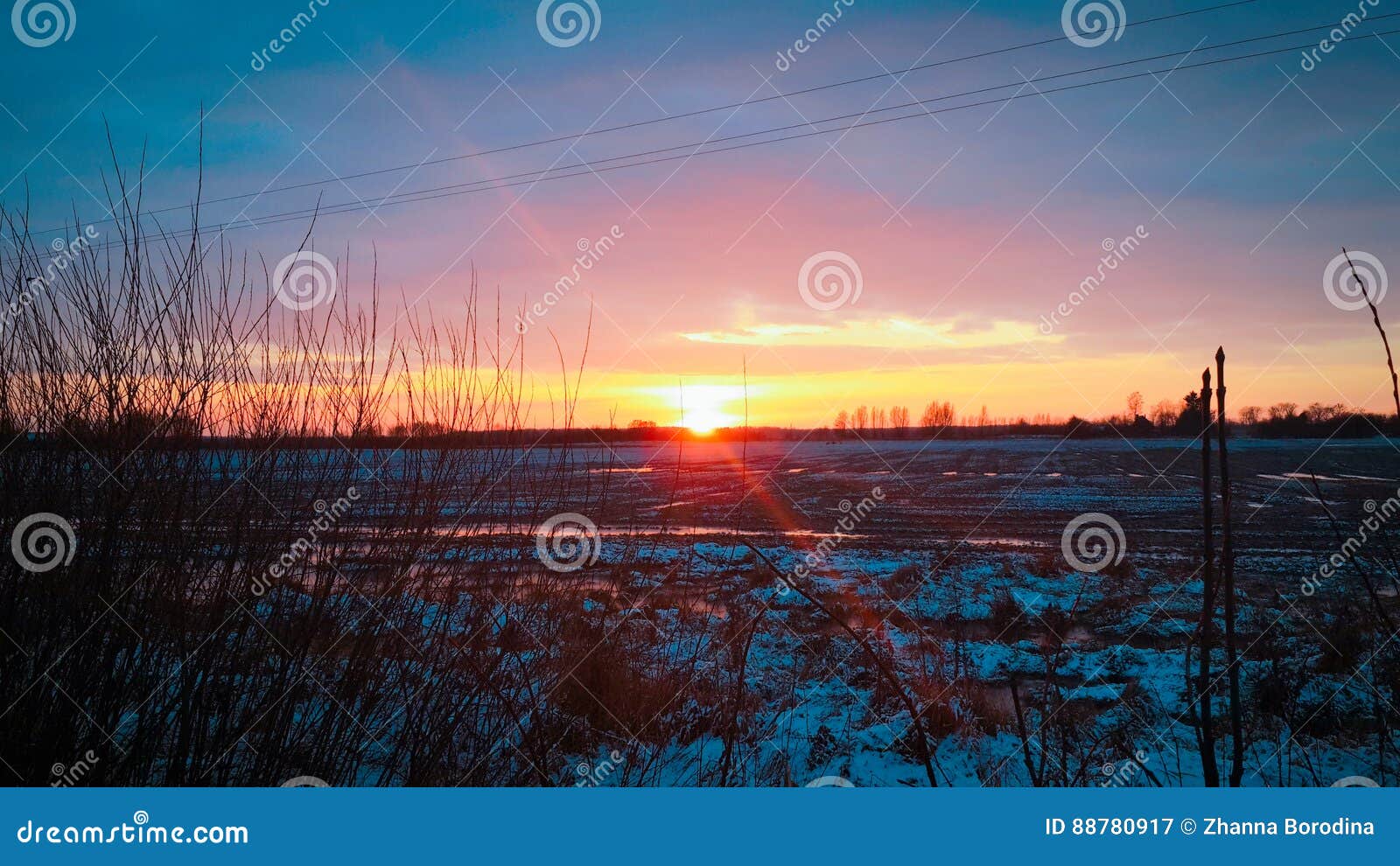 Sunset Over Snow-covered Field Stock Image - Image of nature, frost ...