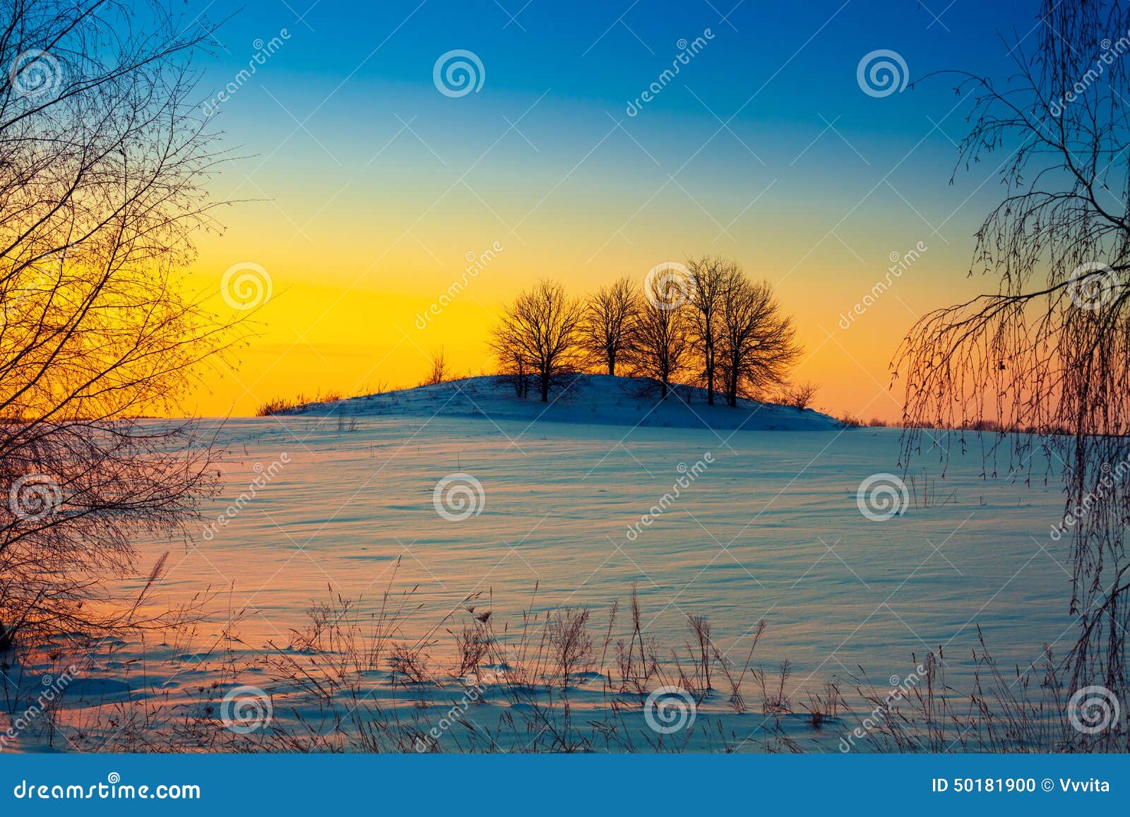 Sunset over snowy field stock photo. Image of outdoor - 50181900