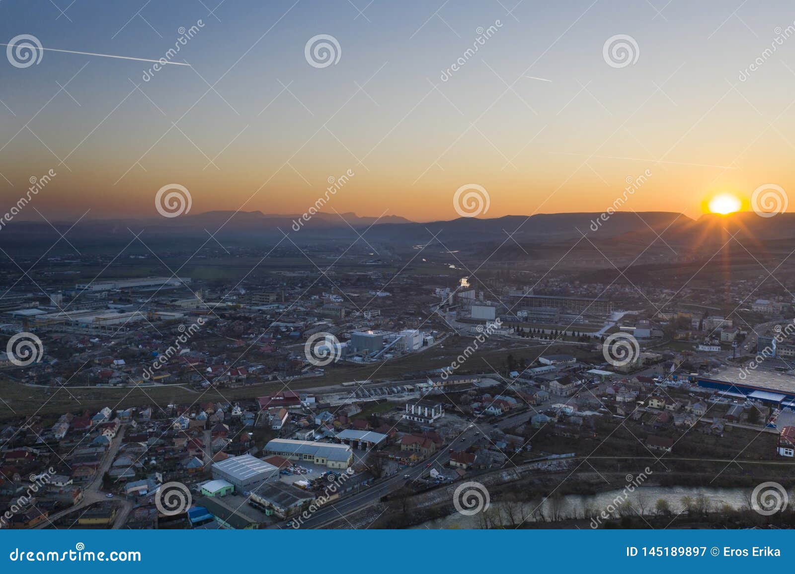 Sunset over the town stock image. Image of dusk, skyline - 145189897
