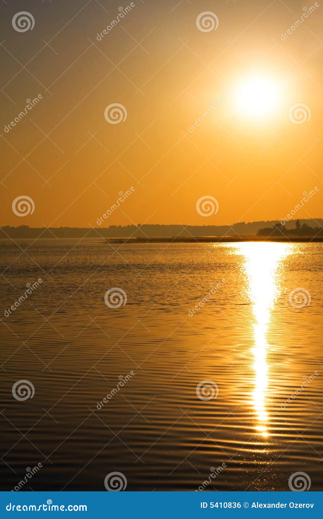 Sunset over water stock photo. Image of summer, heat, orange - 5410836