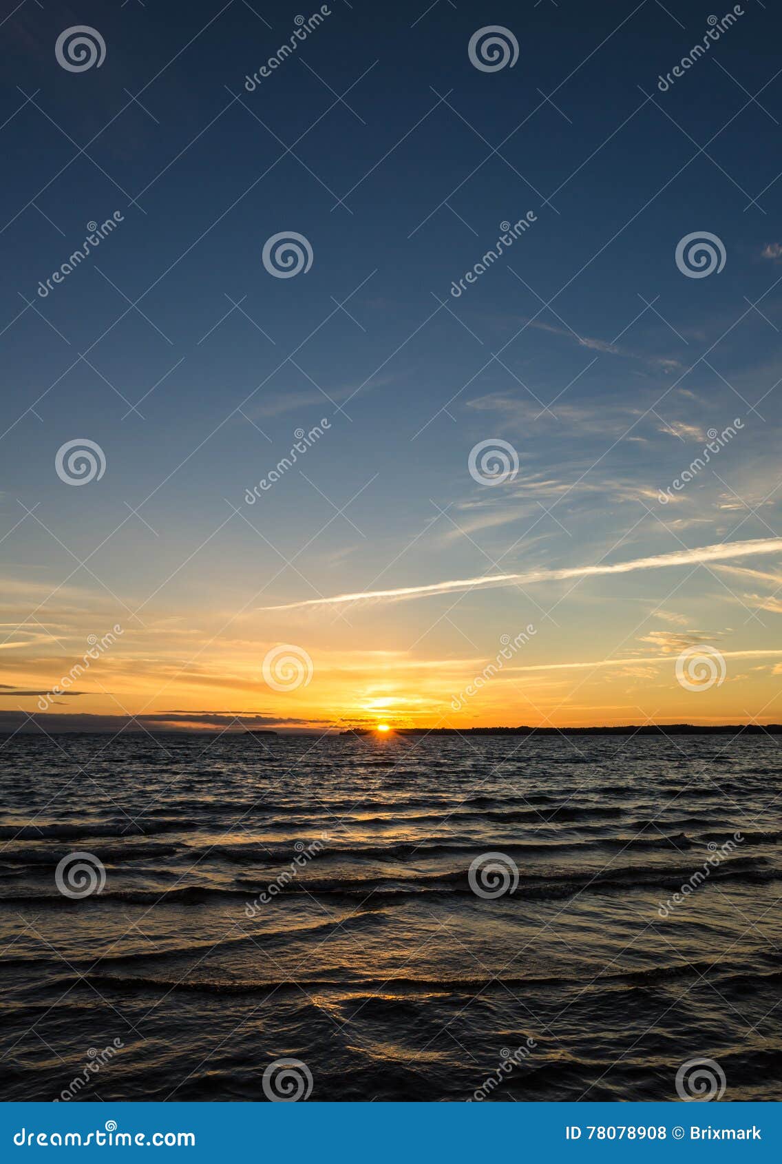 Sunset over the water stock photo. Image of evening, horizon - 78078908