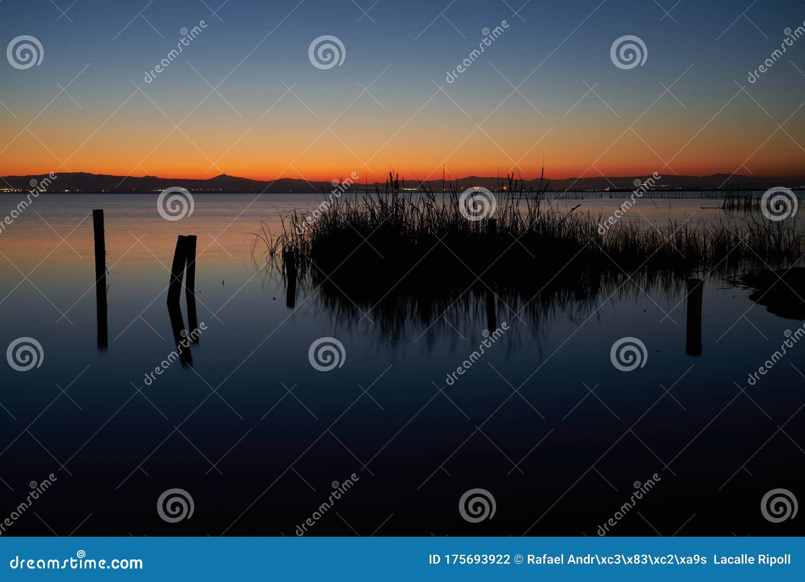 Sunset over a water pond stock photo. Image of city - 175693922