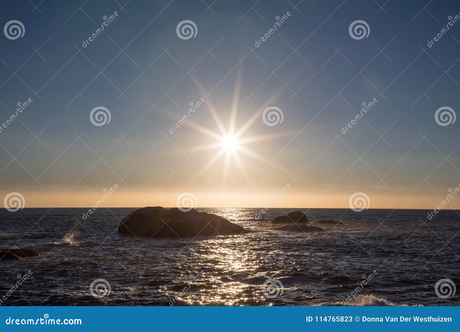 Sunset Over the Water with Rocks Stock Image - Image of ocean, africa ...