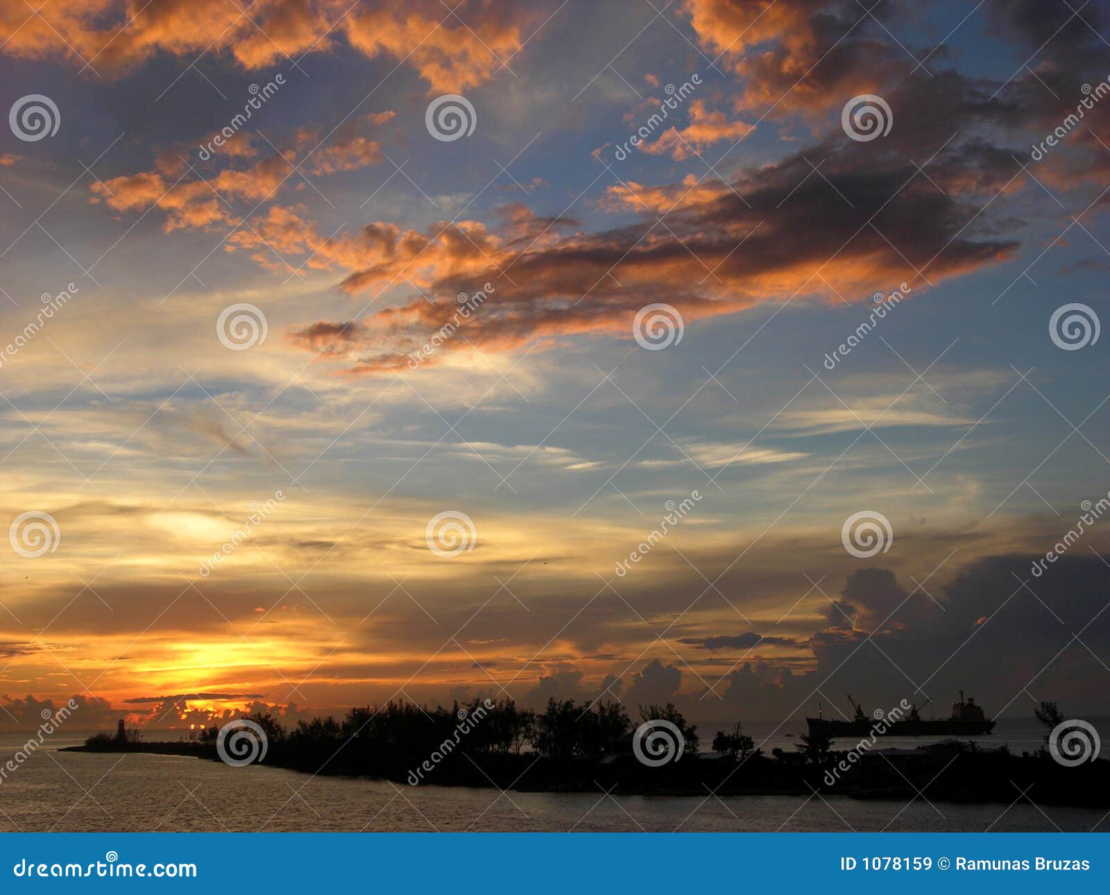 The Sunset in Paradise stock image. Image of island, lighthouse - 1078159
