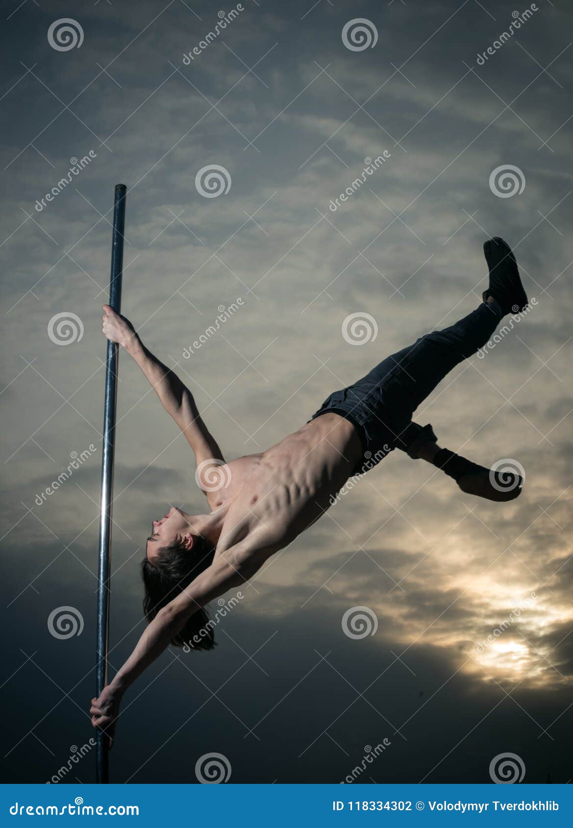 Sunset Pole Dancer. Sunset Sky with Man Dancing on Pylon. Stock Photo ...