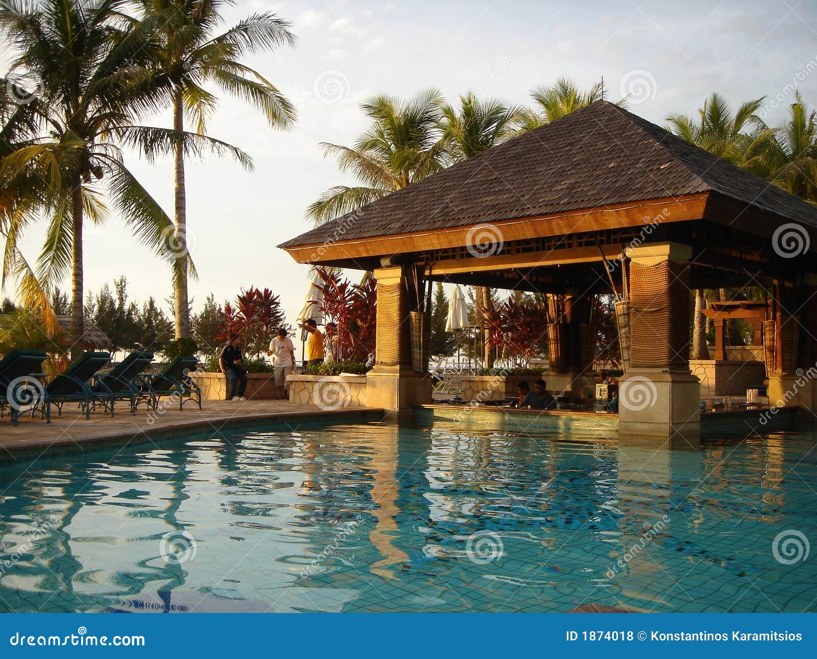 Sunset by the pool stock photo. Image of tropical, pool - 1874018