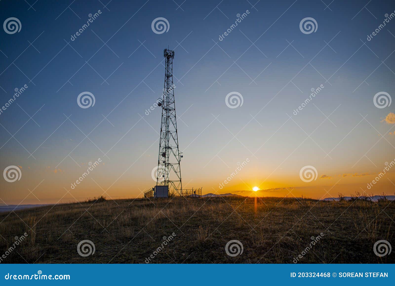 Sunset with the pylon stock photo. Image of garden, fall - 203324468
