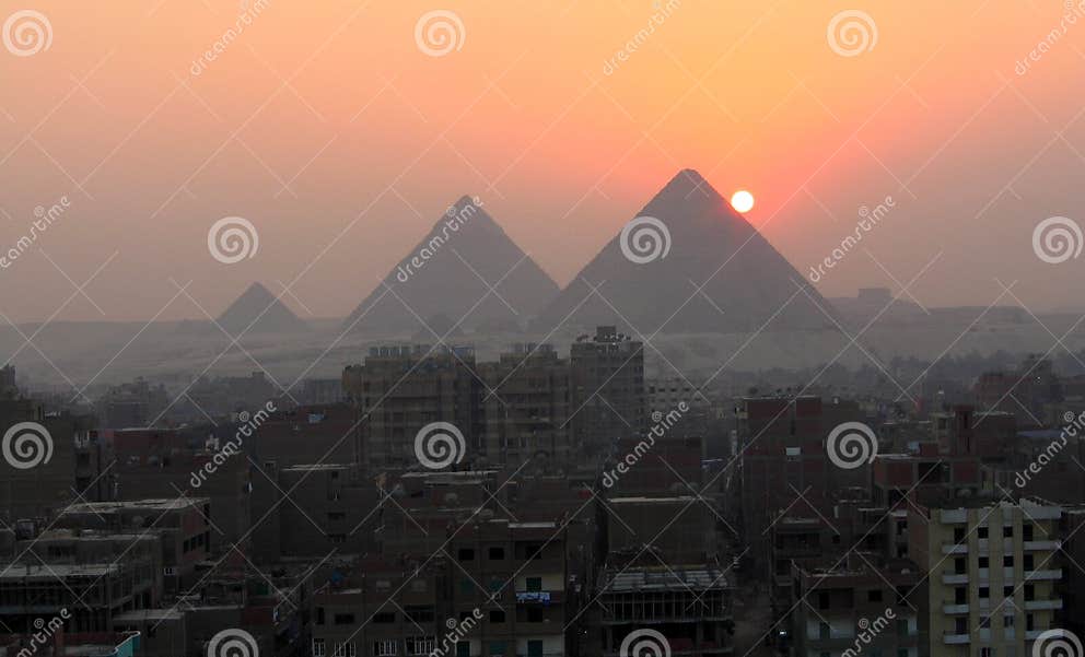 Sunset and the pyramids stock photo. Image of cone, middle - 464388