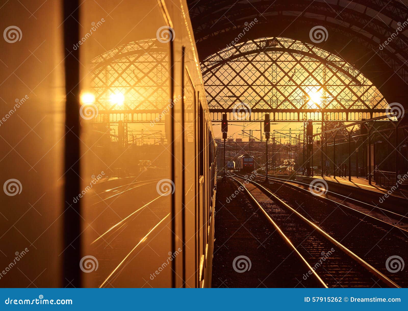 Sunset at railway station stock photo. Image of landscape - 57915262