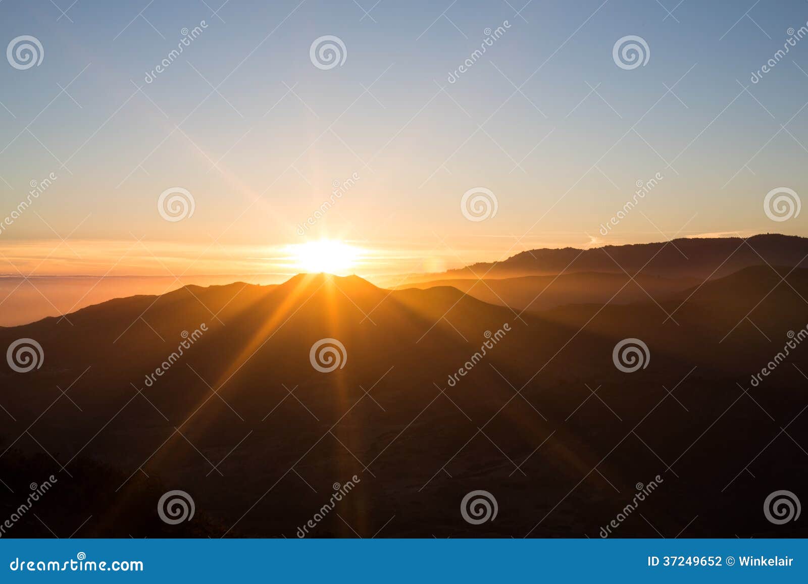 Sunset with Rays Behind Hill Stock Photo - Image of yellow, vista: 37249652