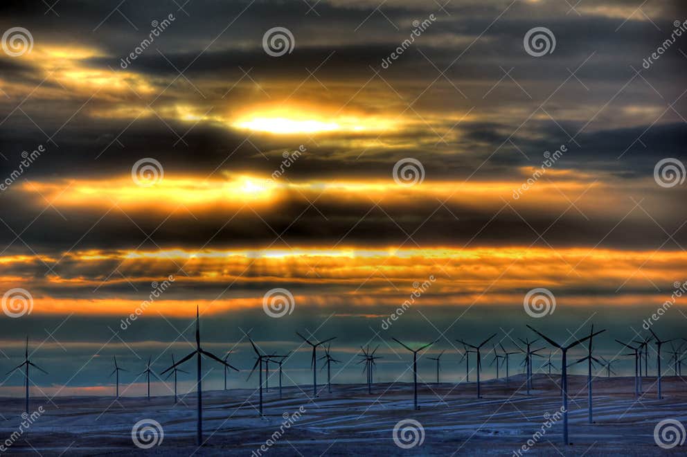Sunset rays on wind mills stock photo. Image of towers - 23746038