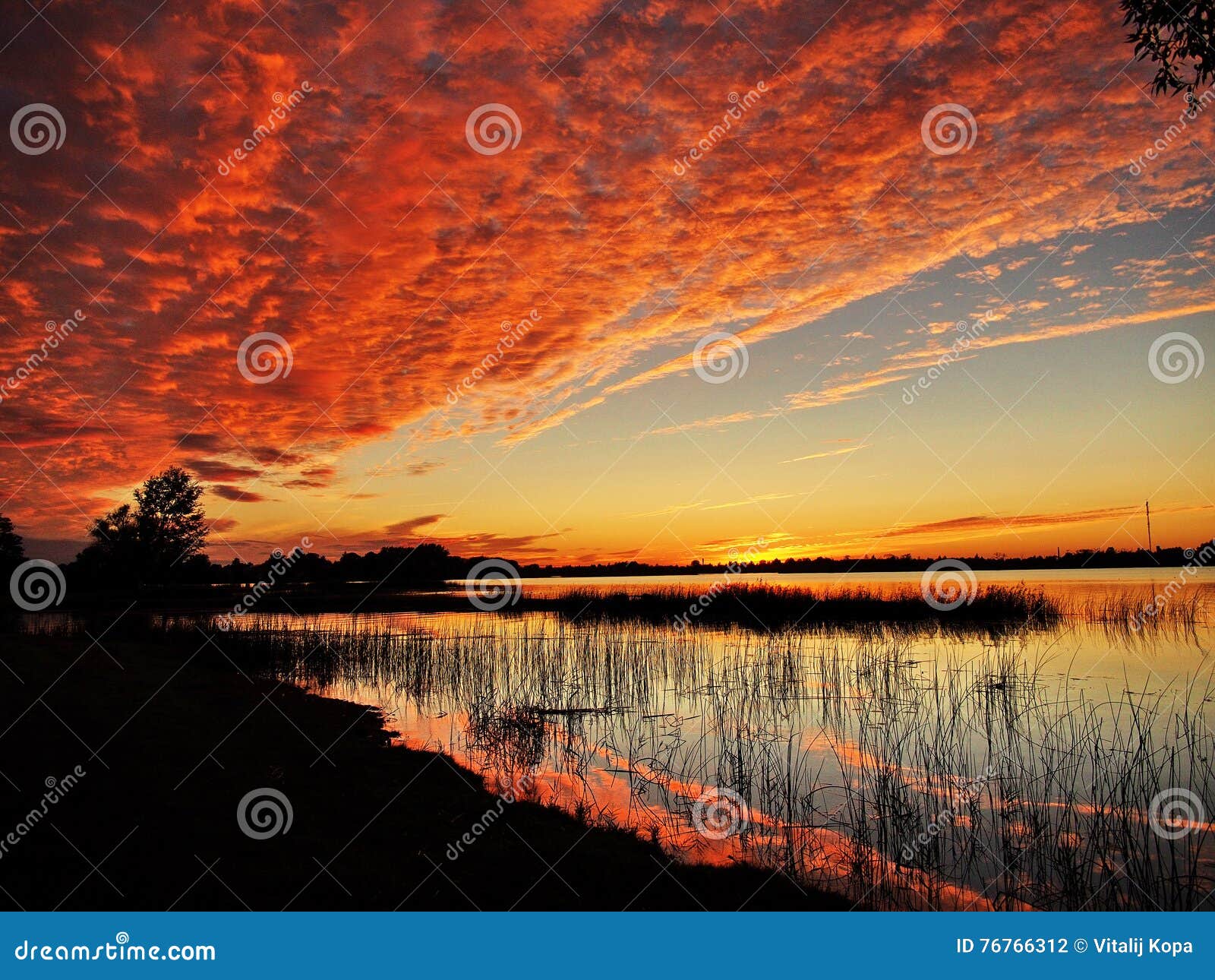 Landscape with Warm Sunset and Red Clouds Stock Photo - Image of wave ...