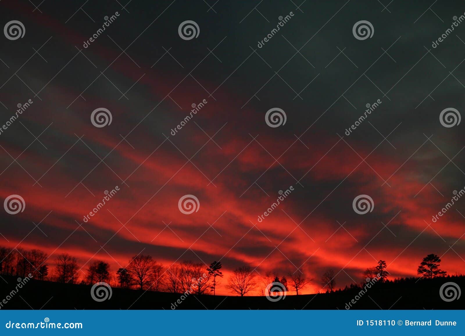 Sunset Red Streaks stock photo. Image of skyline, landscape - 1518110