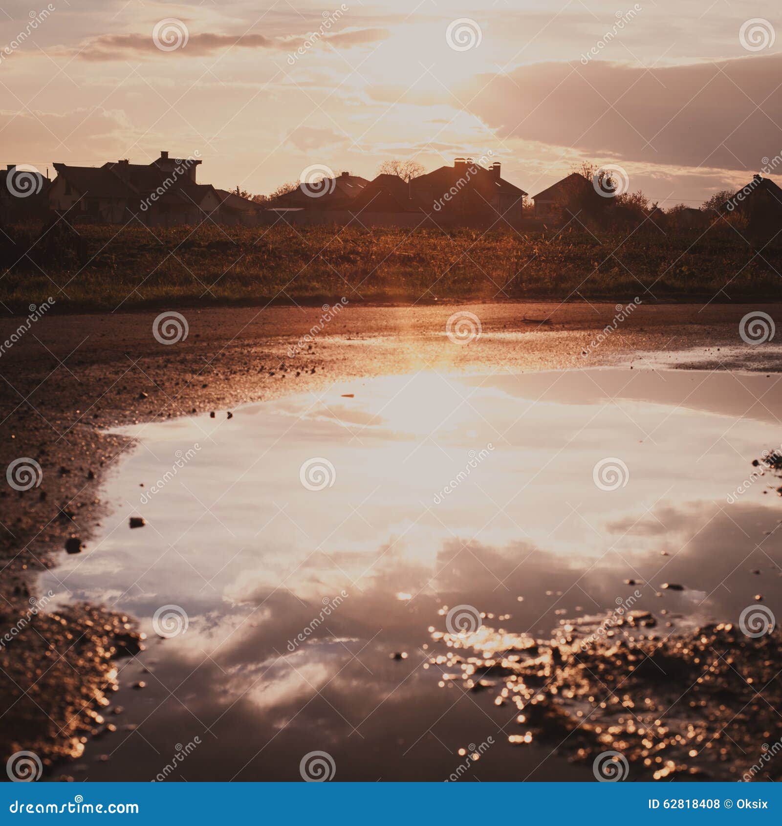 The sunset reflected stock photo. Image of puddle, nature - 62818408