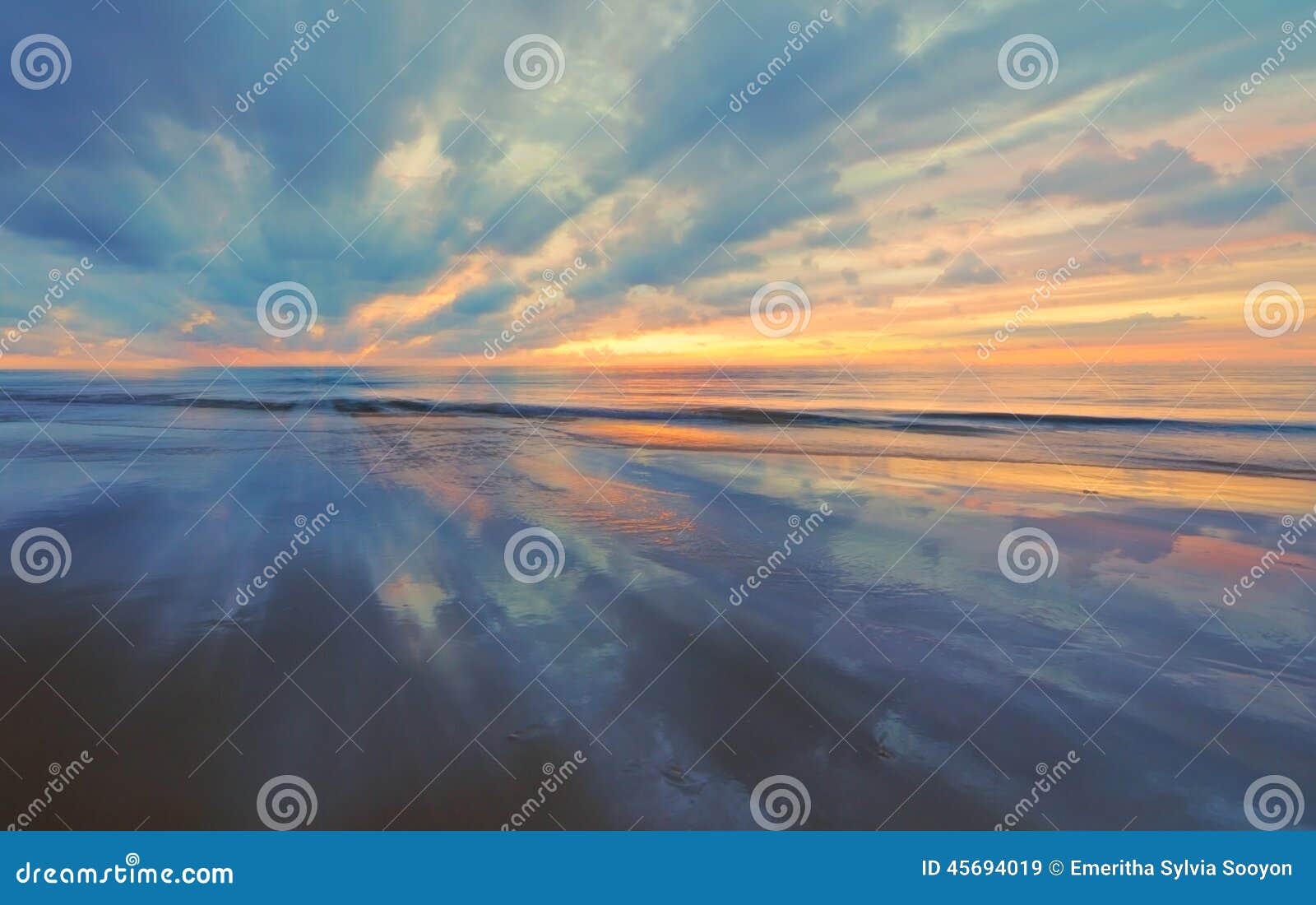 Sunset with Reflection on Sand with Slight Zoom Blura Stock Image ...