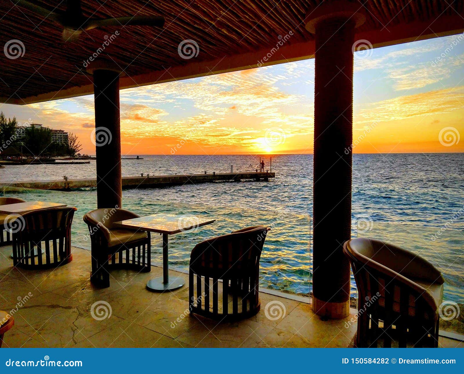 Sunset Restaurant stock photo. Image of seaside, sunset - 150584282