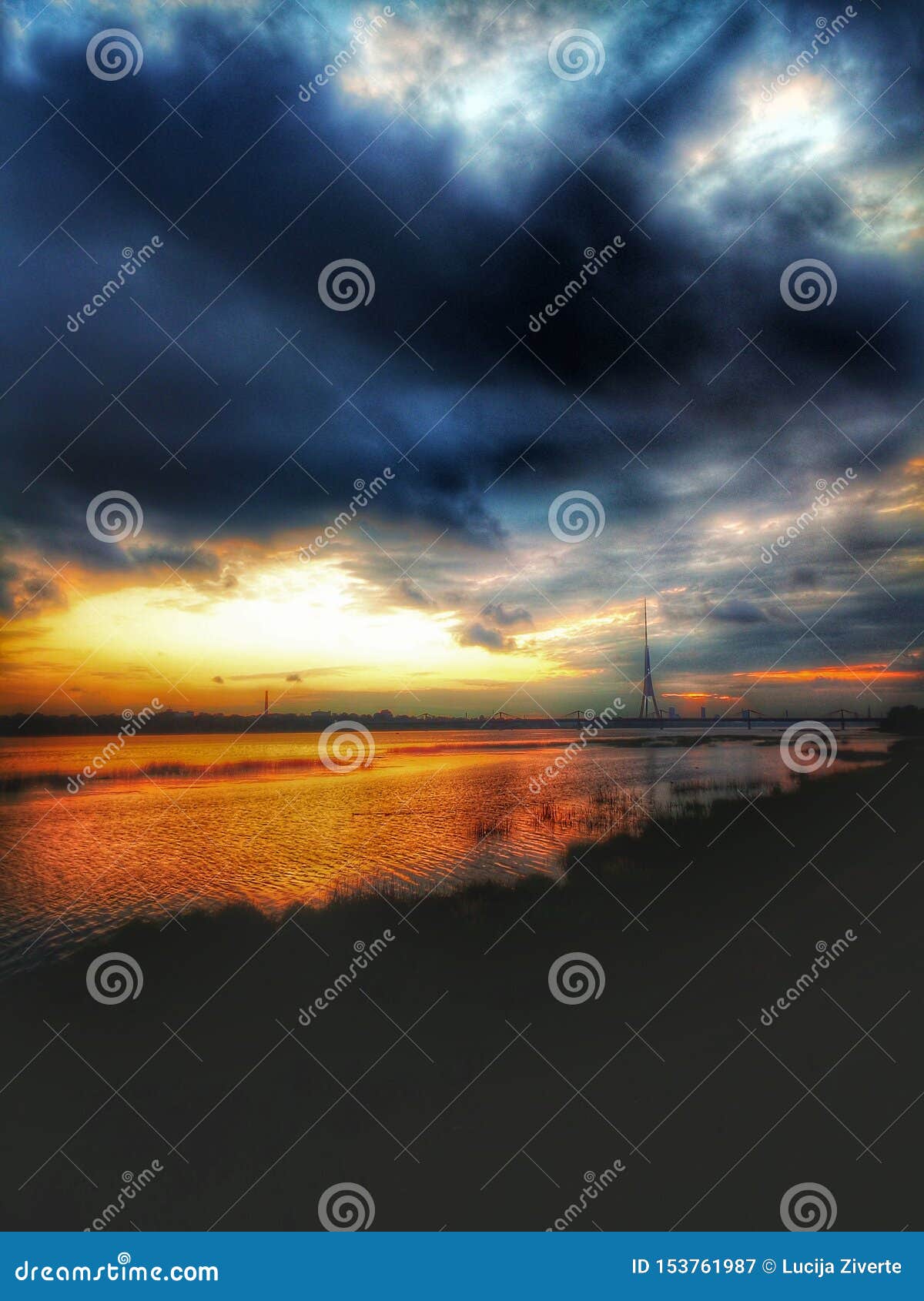 Sunset in Riga, Latvia stock image. Image of sunset - 153761987