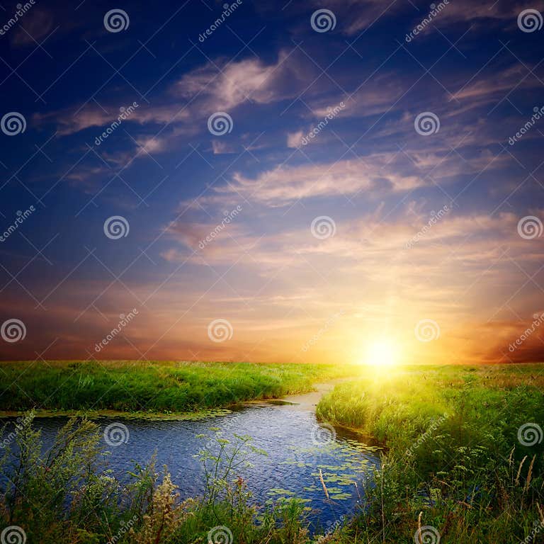 Sunset on the river stock photo. Image of sunny, grass - 16381036