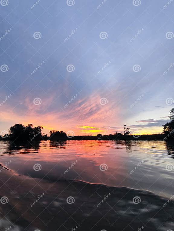 Sunset at the river stock photo. Image of river, beautifulsky - 332060692