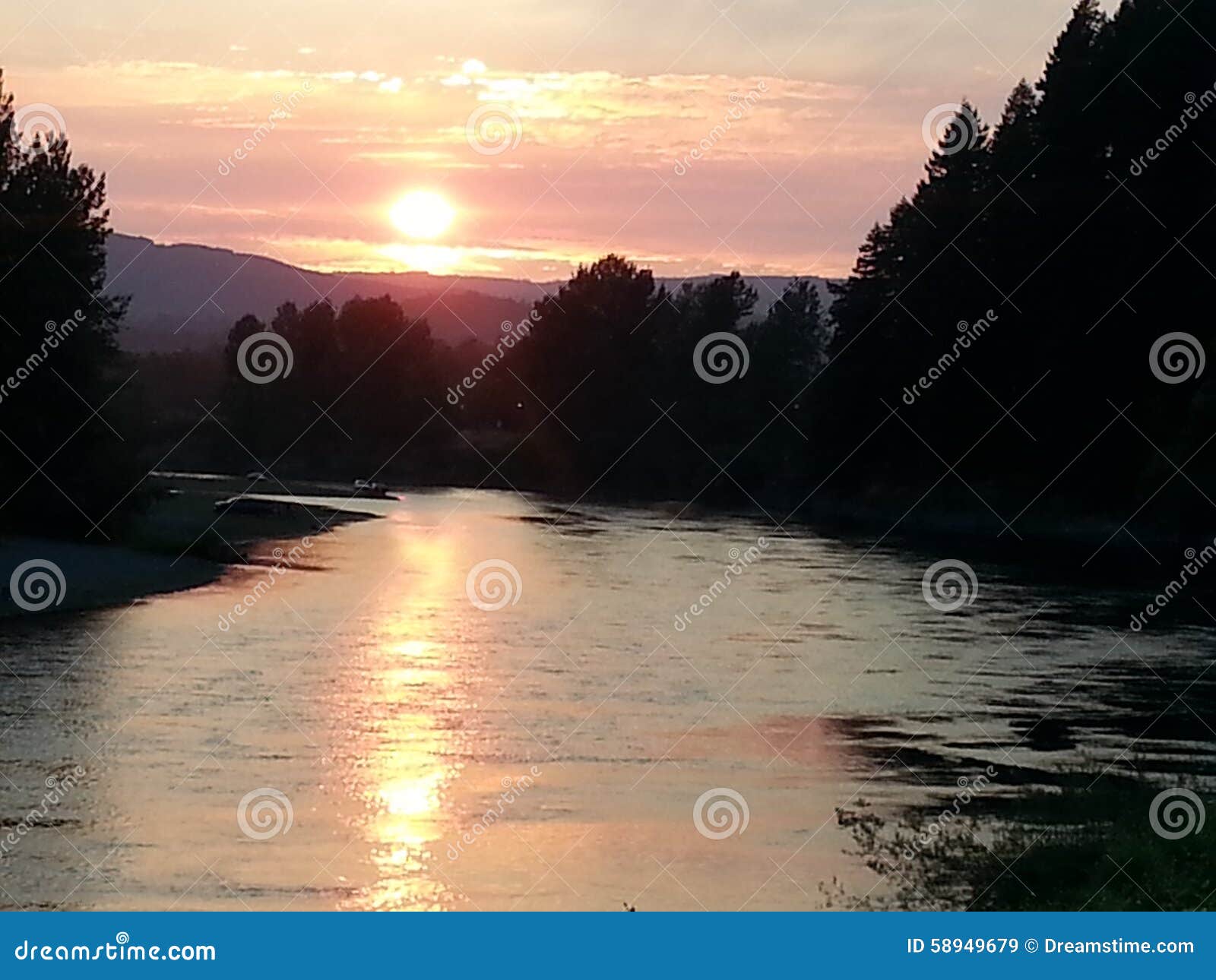 Sunset on river stock image. Image of reflection, rock - 58949679