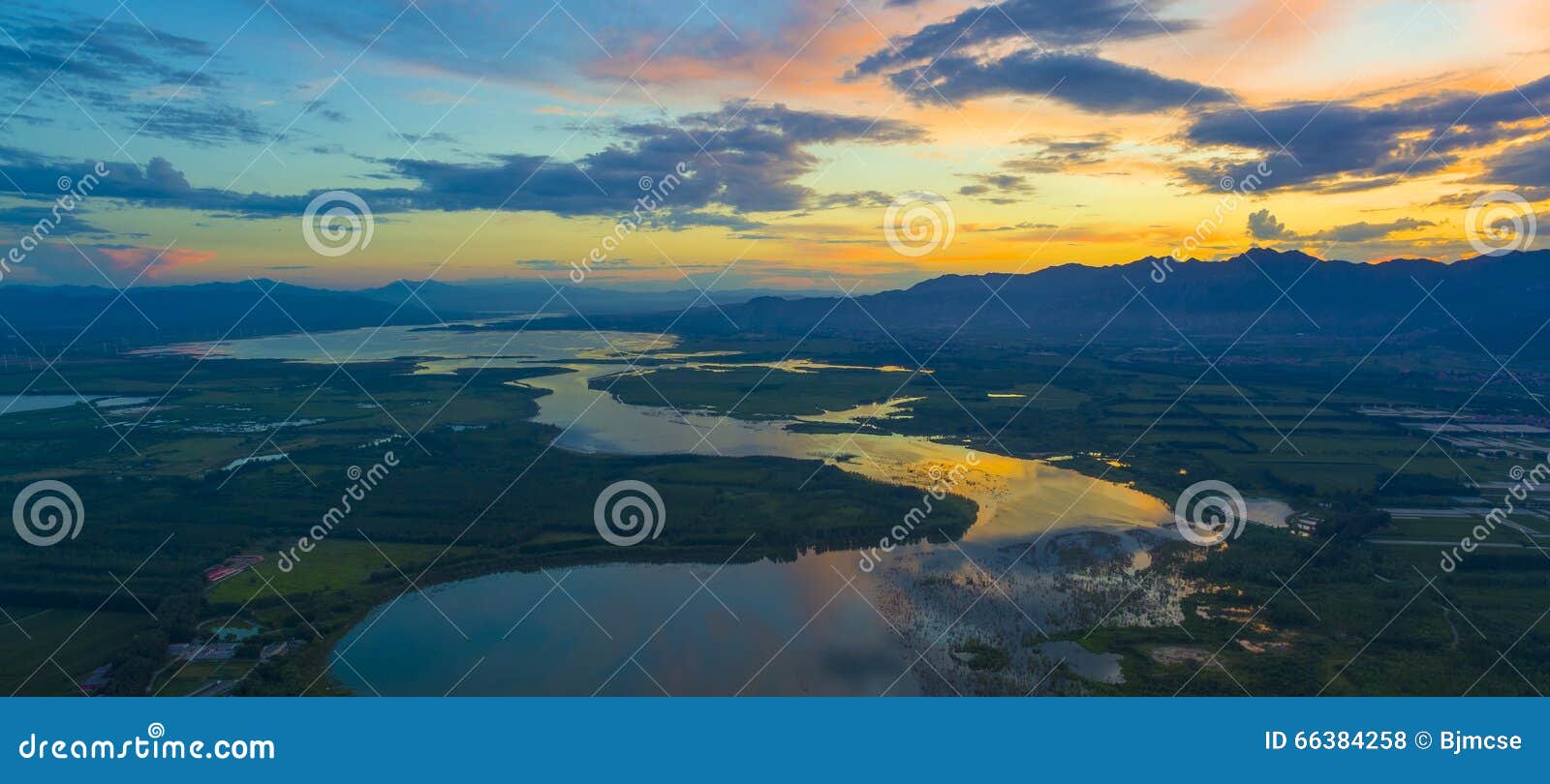 Sunset on River and Farmland Stock Photo - Image of bright, mountain ...