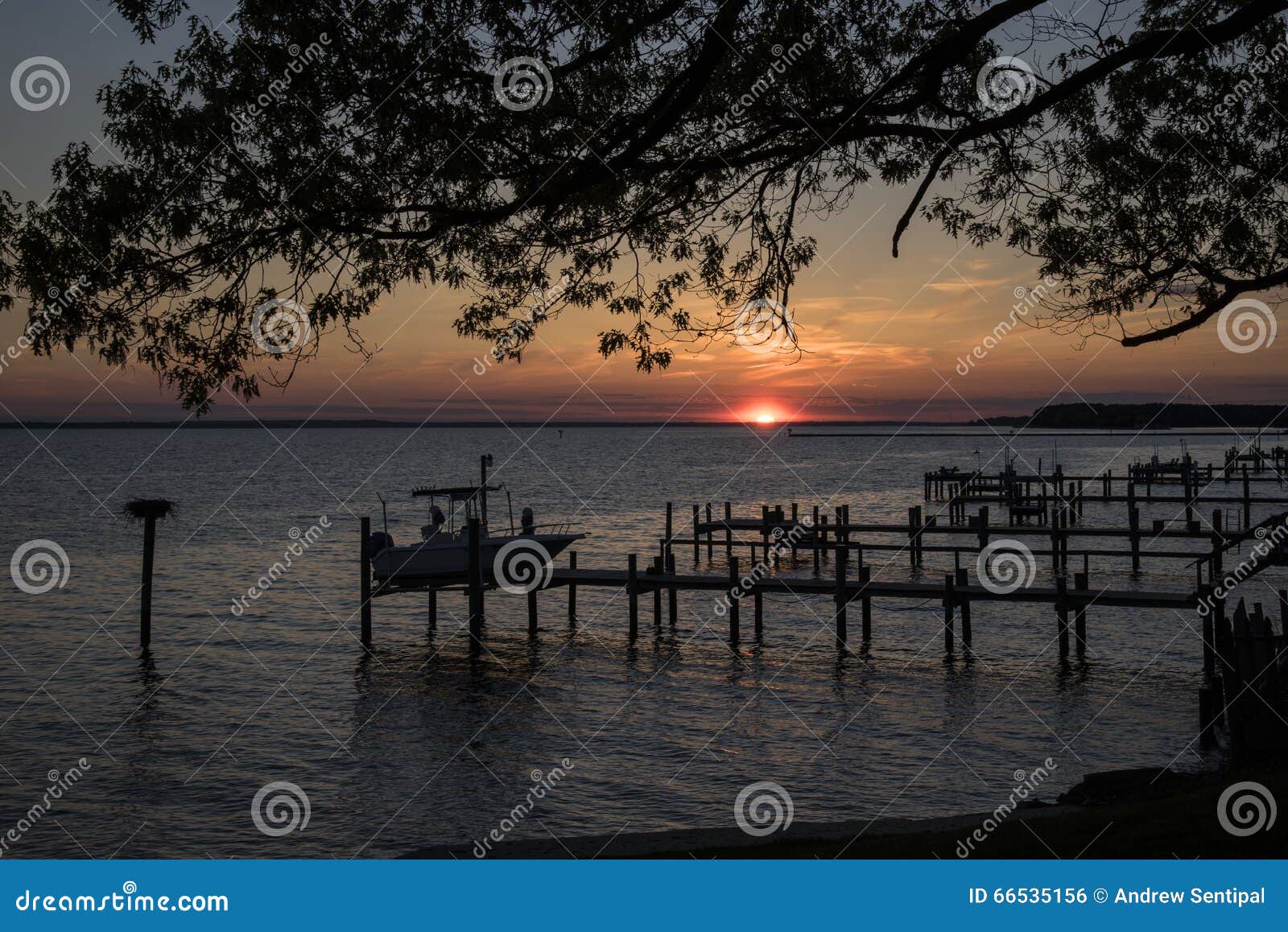 Sunset at the rivers edge stock photo. Image of horizon - 66535156