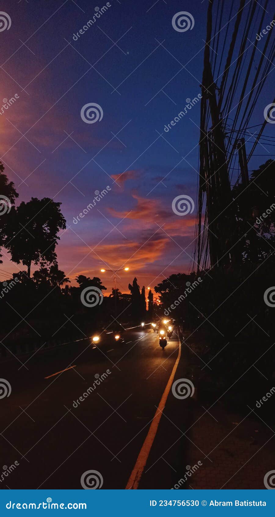 Sunset in the Road at Denpasar, Bali Stock Photo - Image of sunset ...