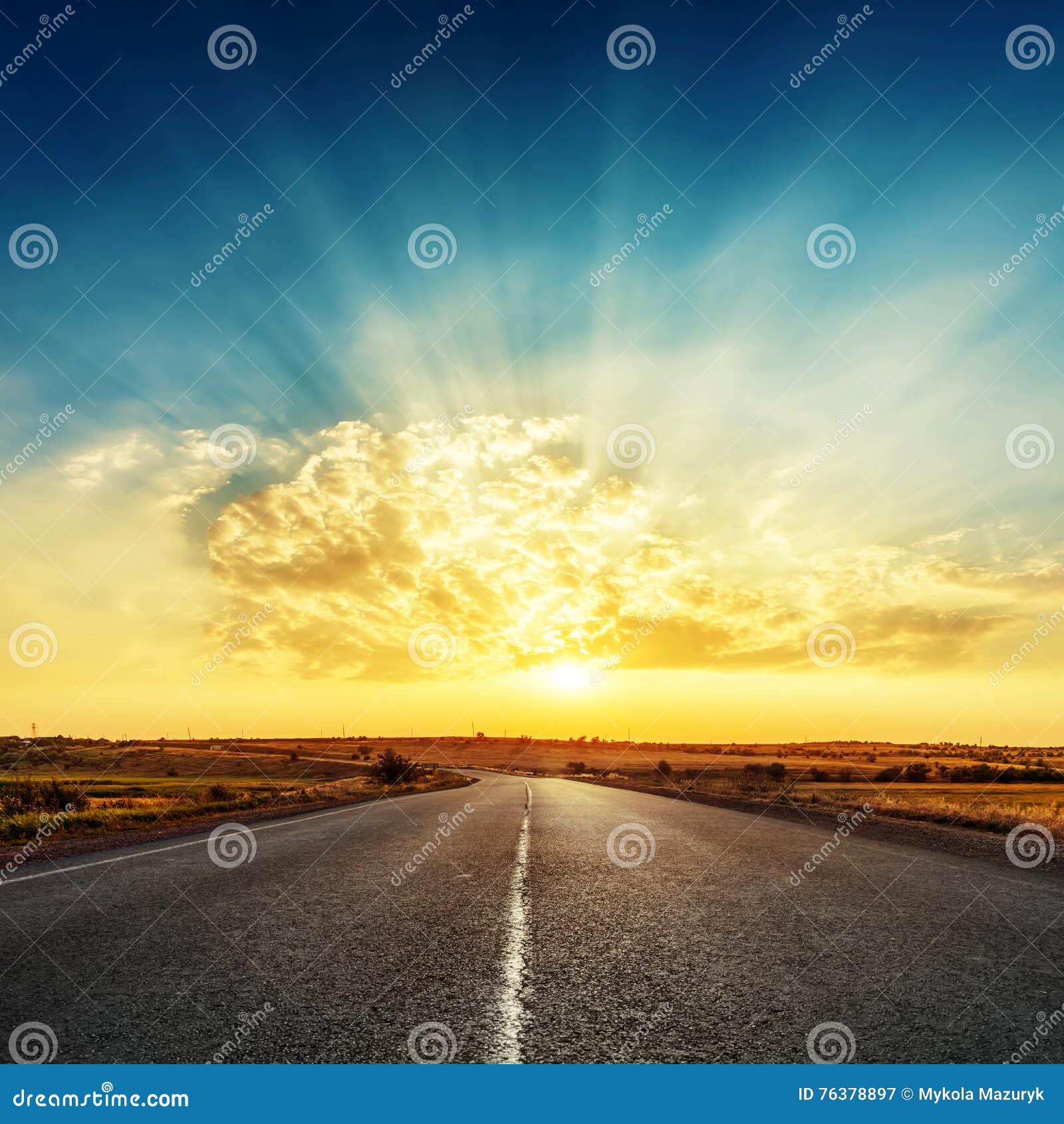 Sunset and road to horizon stock image. Image of country - 76378897