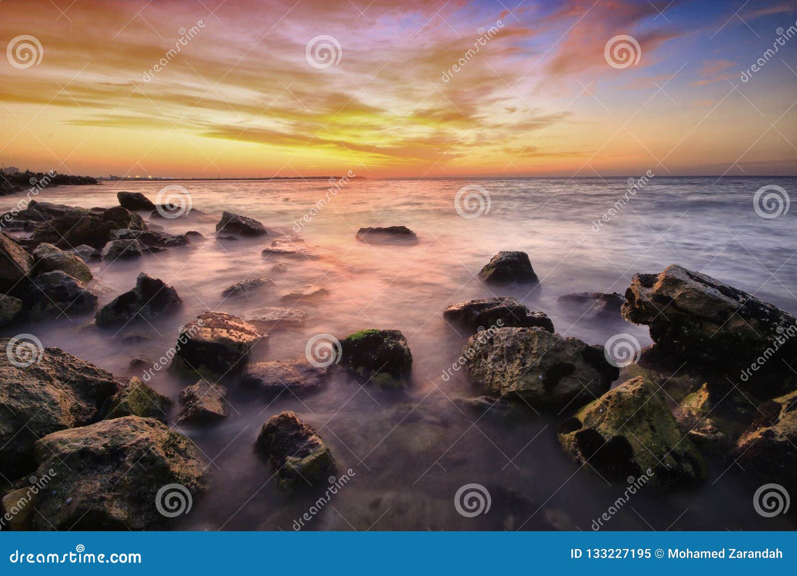 Sunset with Rocks on the Seashore Stock Image - Image of hope, carrying ...