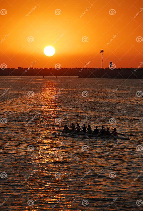 Sunset Rowing Crew stock photo. Image of twilight, team - 4586910