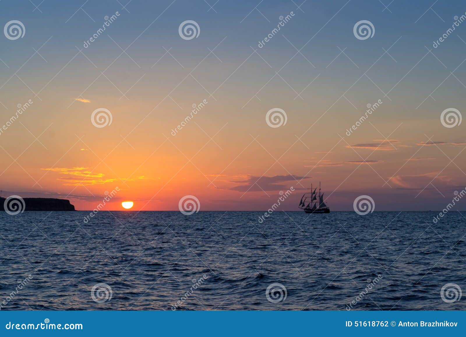 Sunset with sailing ship stock photo. Image of sailing - 51618762
