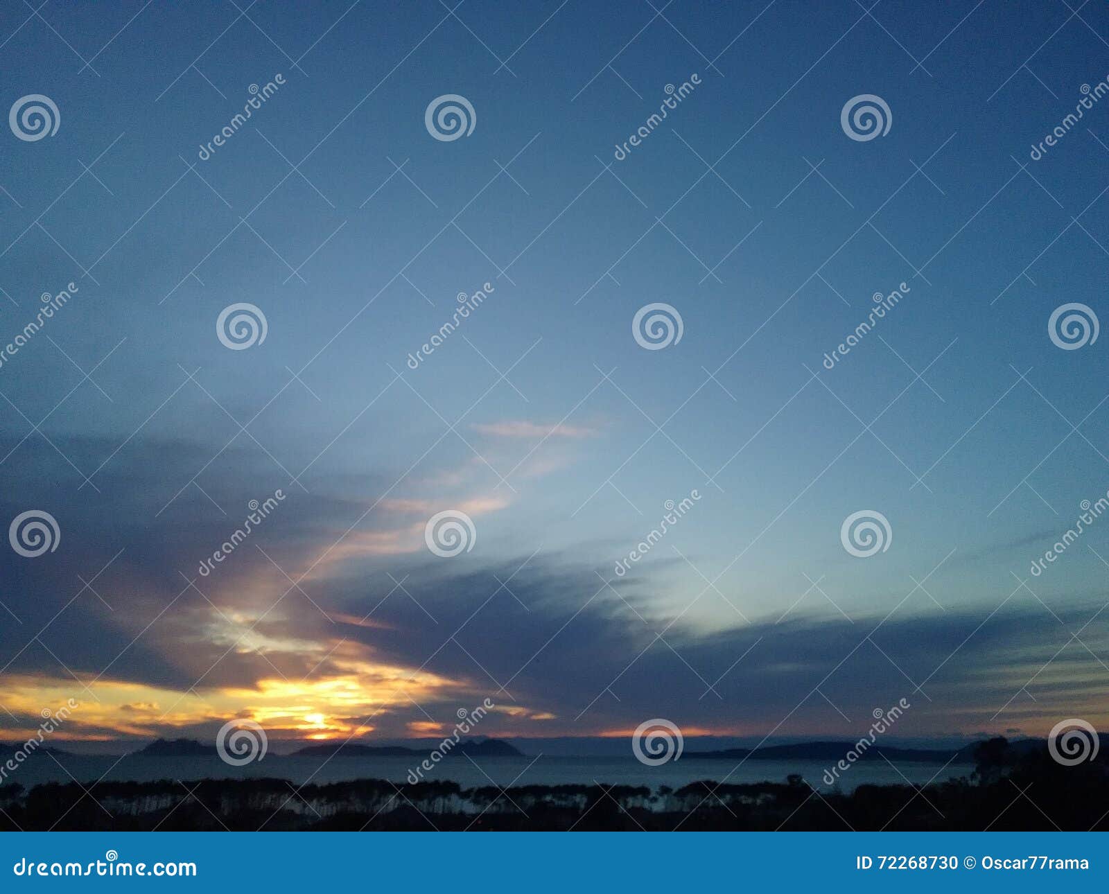 Sunset in samil beach stock photo. Image of cies, orange - 72268730