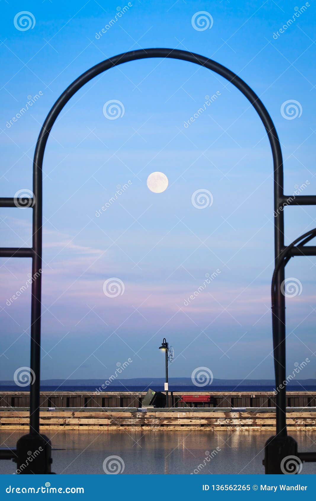 Sunset Scene of the Moon Over the Marina Dock at Cold Lake, Alberta ...