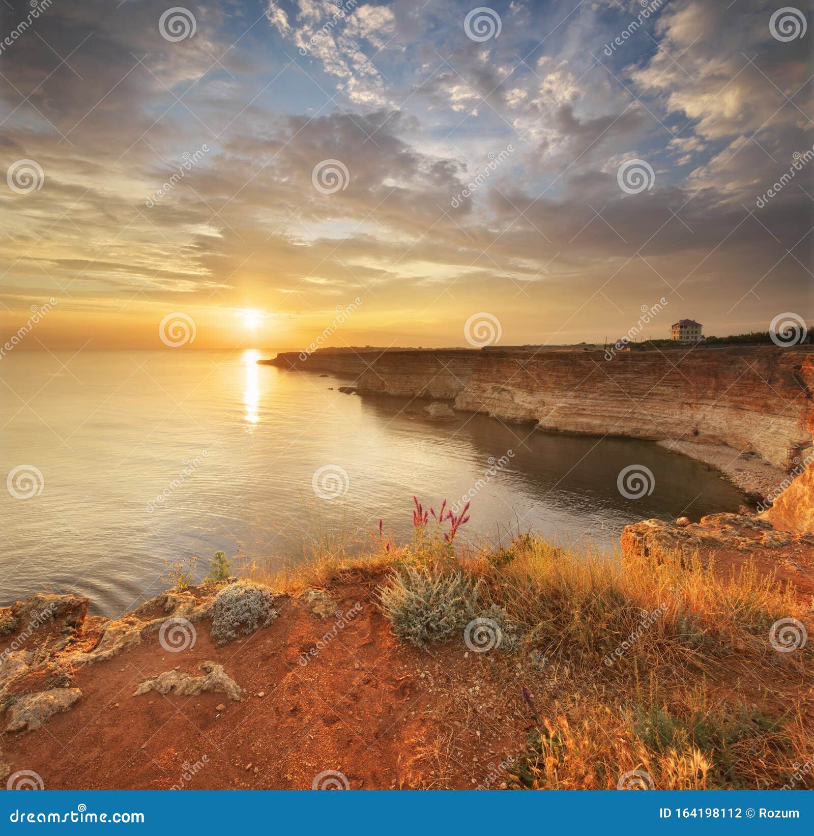 Sunset on he sea cliffs stock photo. Image of scenic - 164198112