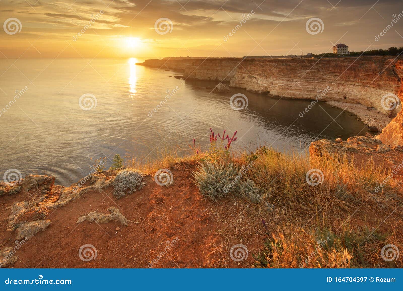 Sunset on sea cliffs stock image. Image of highest, beach - 164704397