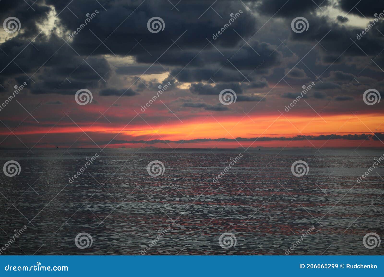 Sunset in the Sea with Dark Clouds Stock Image - Image of background ...