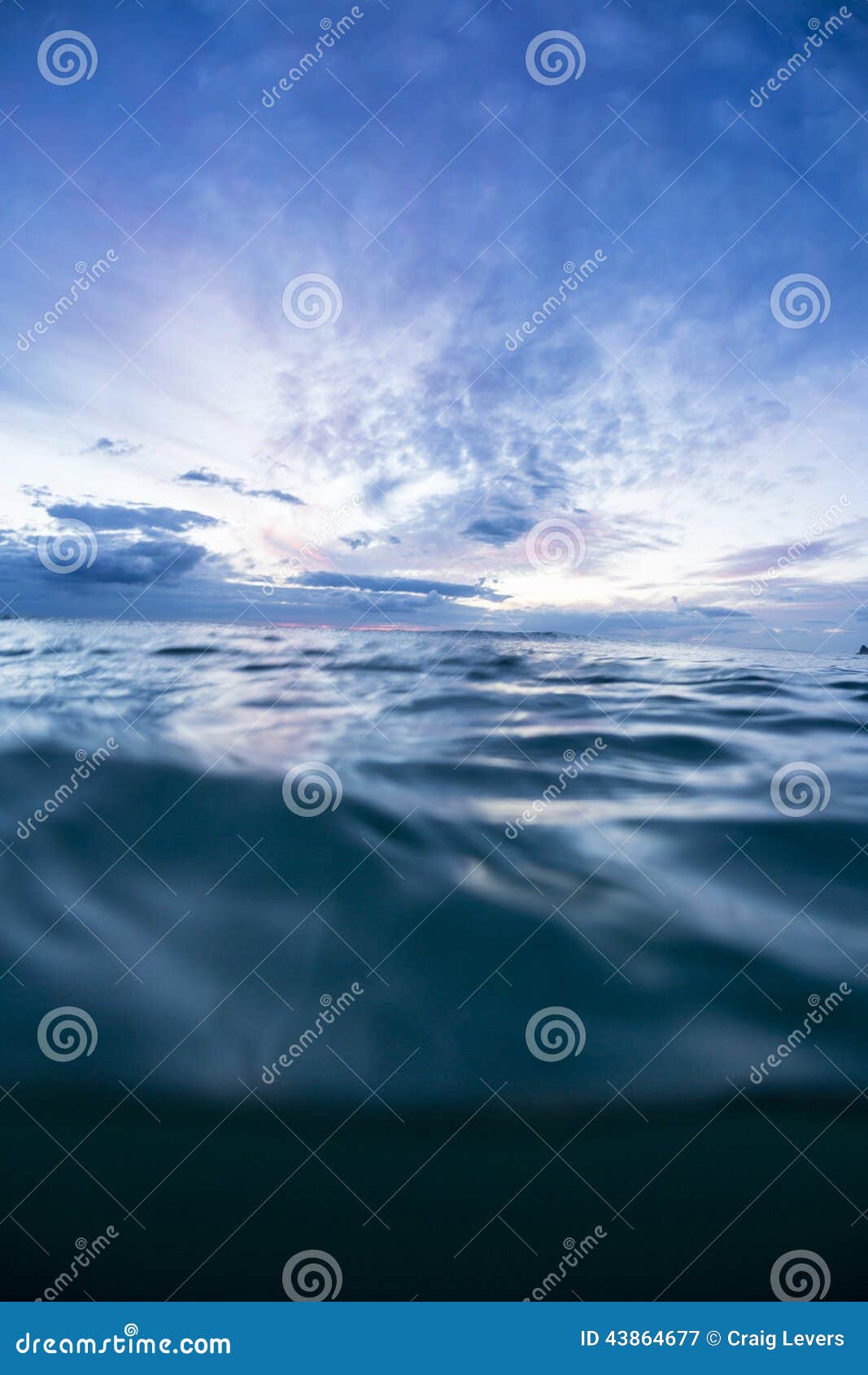 Sunset at Sea Level stock image. Image of cloudscape - 43864677