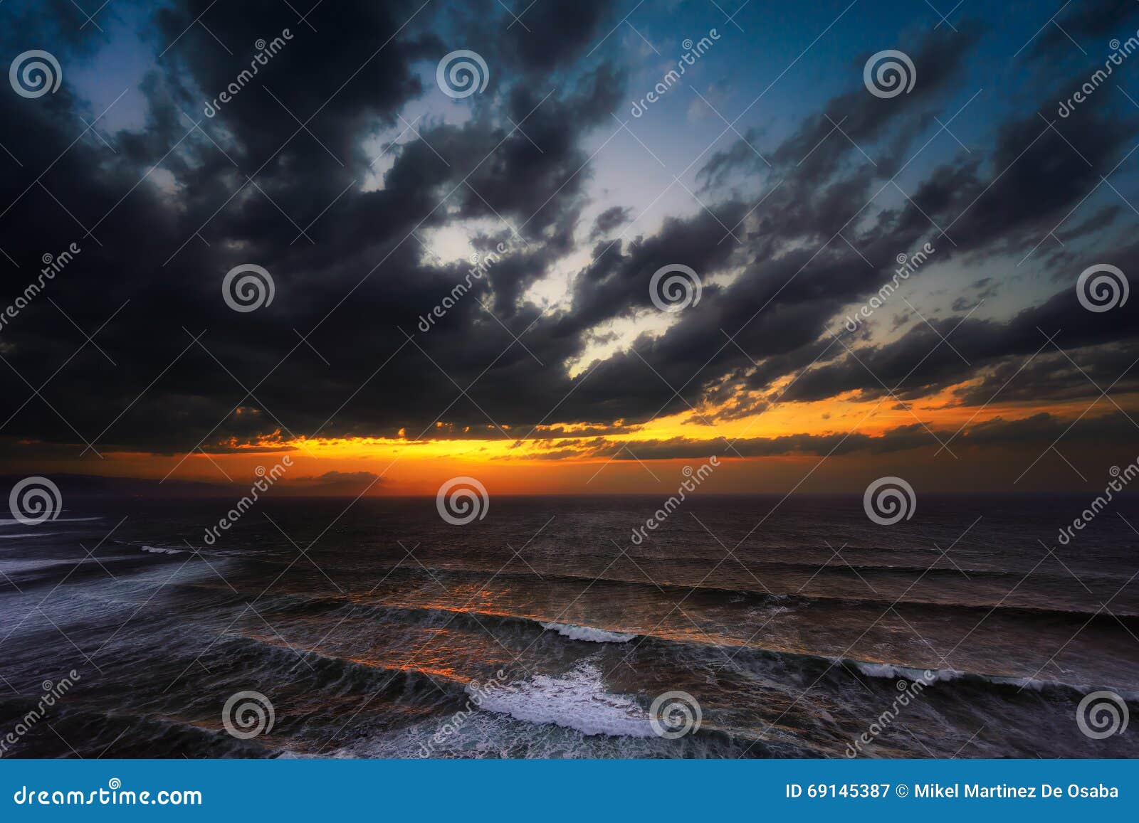Sunset in the Sea with Rough Sea Stock Image - Image of horizon, sunset ...