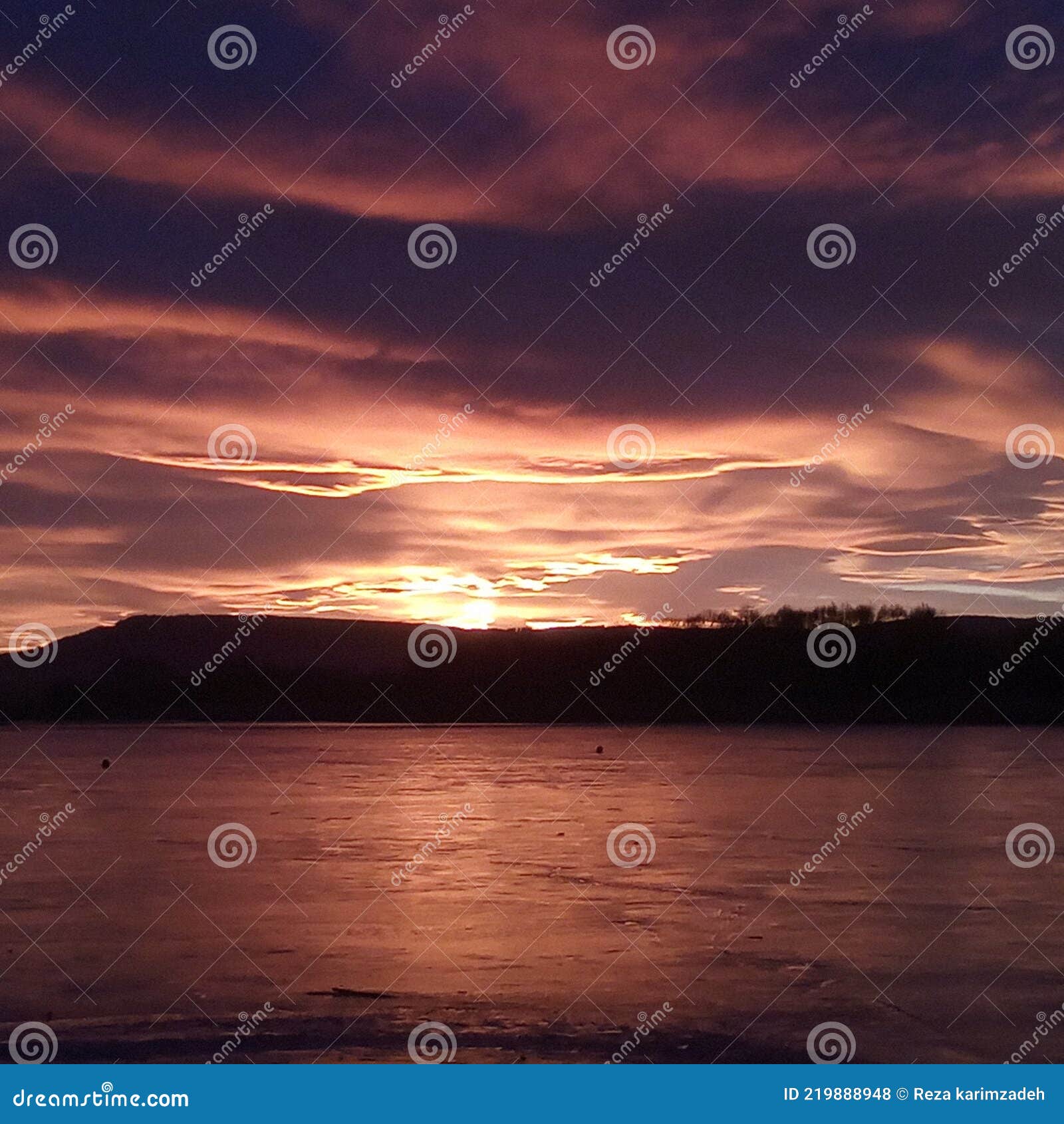 Sunset and seaview stock photo. Image of shore, cloud - 219888948
