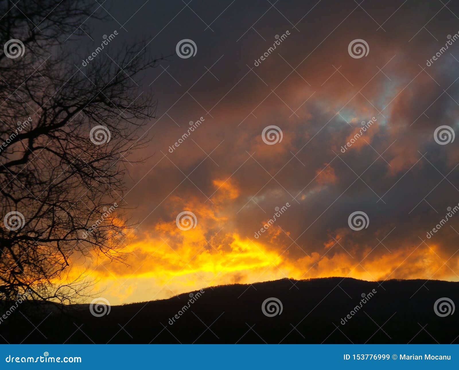 Sunset Like a Fire in the Sky Stock Image - Image of town, sunset ...